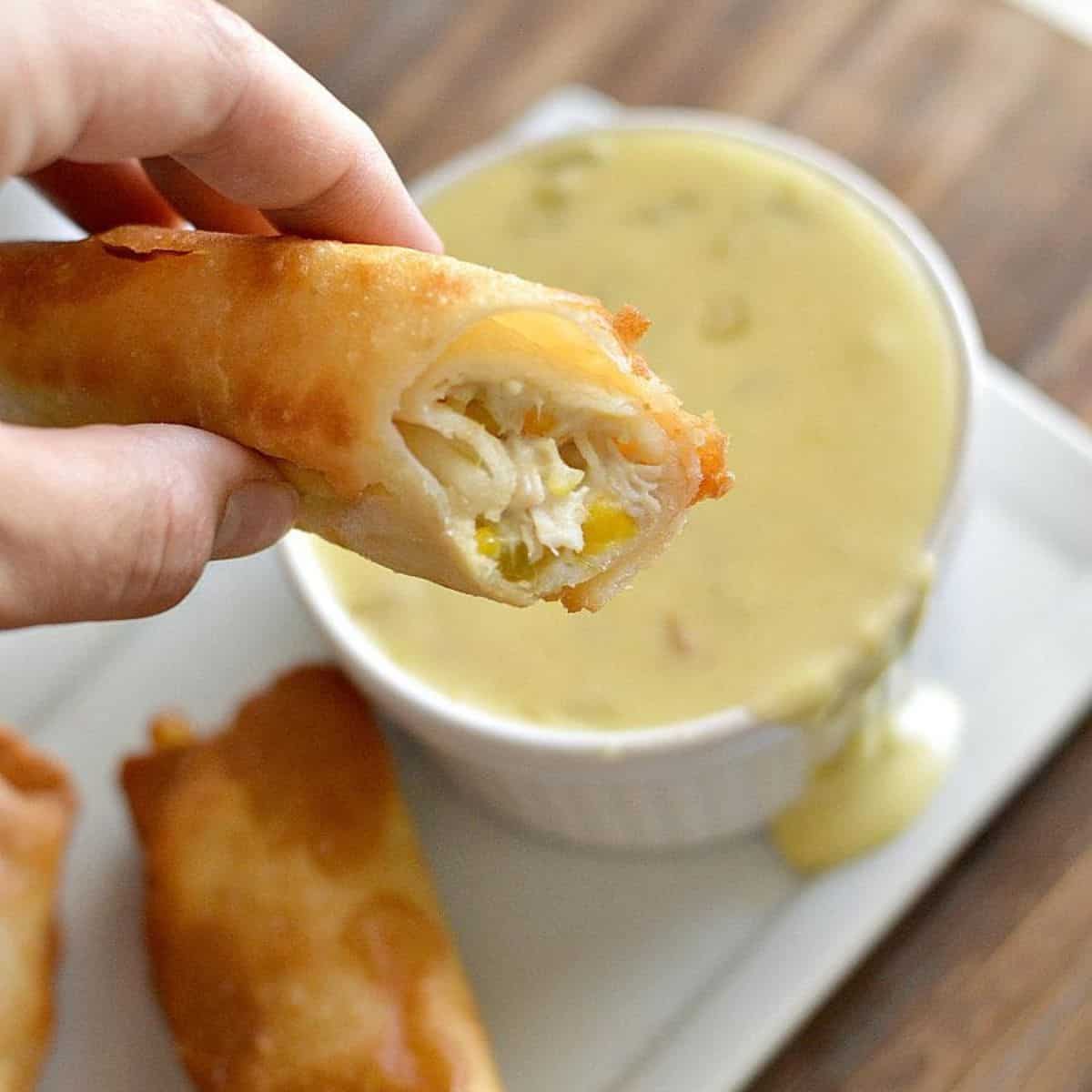 Rolled Tacos with Spicy Queso Sauce - This Vivacious Life